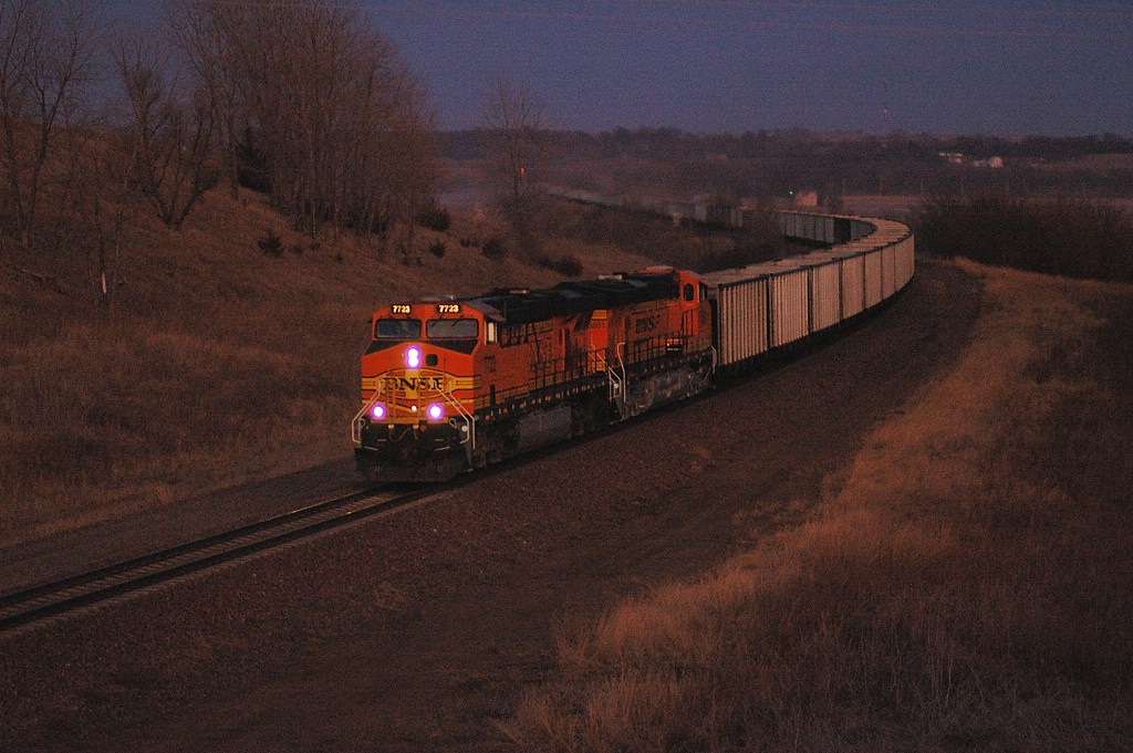 BNSF 7723, GEVO ES44DC, speeds westbound with empties